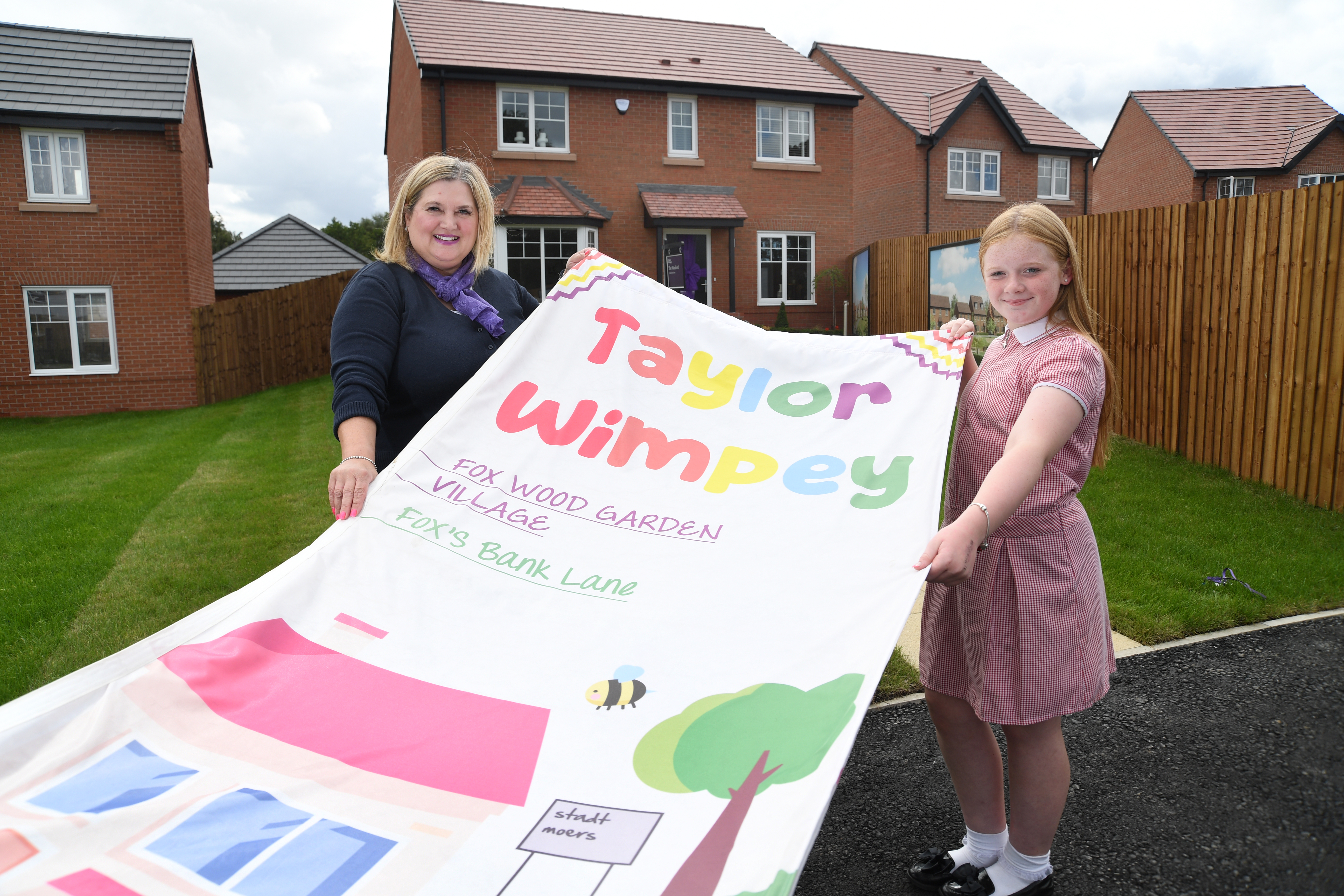 Whiston school children create colourful flag designs for Fox Wood ...